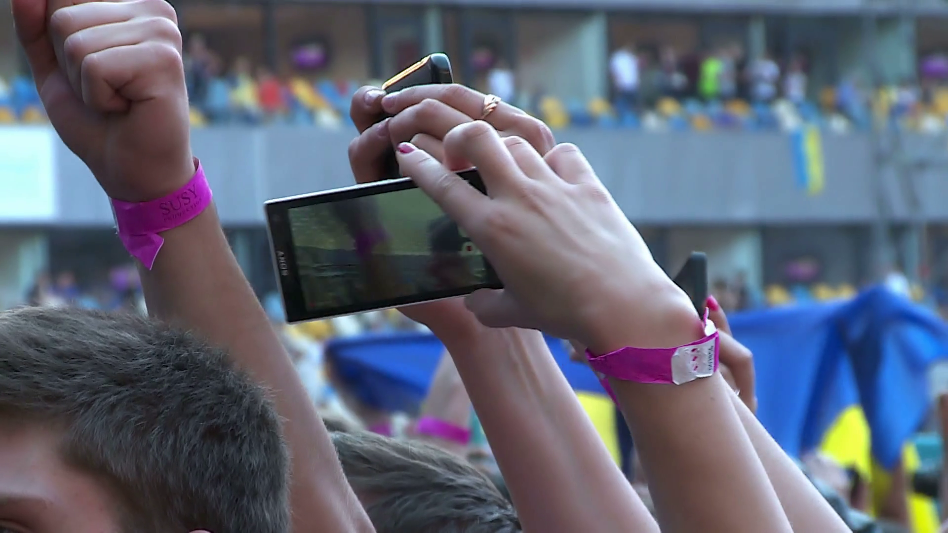 Fans Waving Hands Hold Phone With Digital Stock Footage SBV-311470164 ...