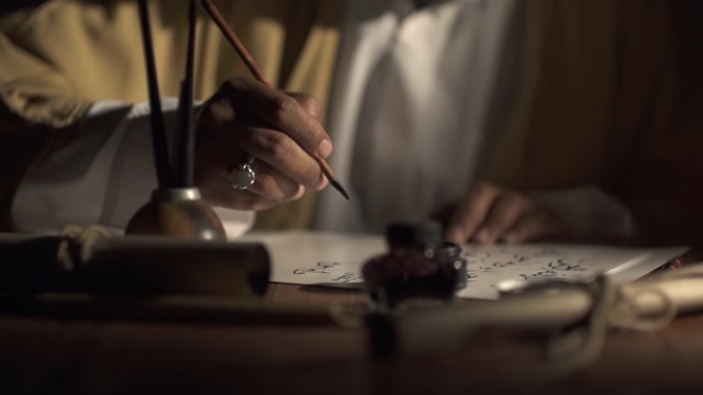 Writing On Scroll Stock Footage: Royalty-Free Video Clips - Storyblocks