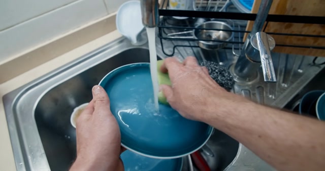 MAN UNSTOPPING KITCHEN SINK Stock Footage: Royalty-Free Video Clips ...