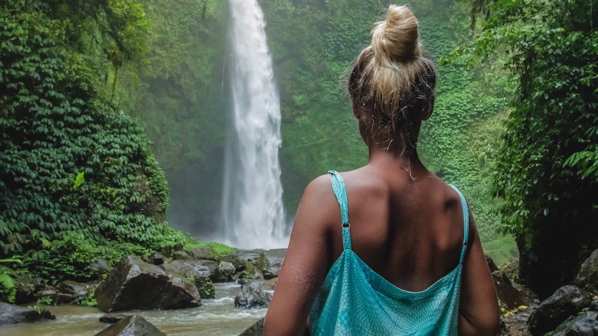 Women In Front Of Tropical Waterfall Stock Footage SBV-338042389 ...