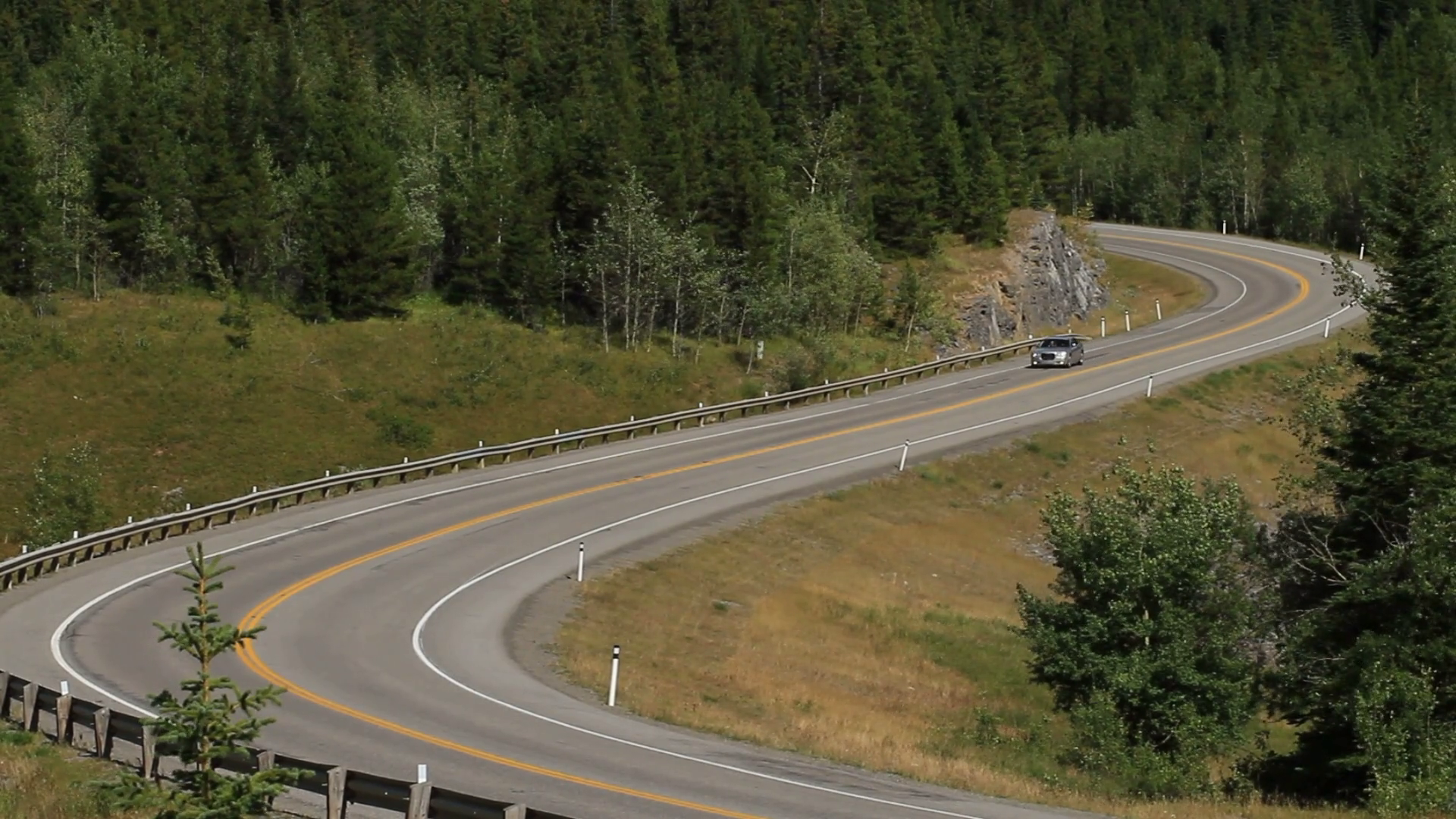 Car on winding country road Stock Video Footage - Storyblocks
