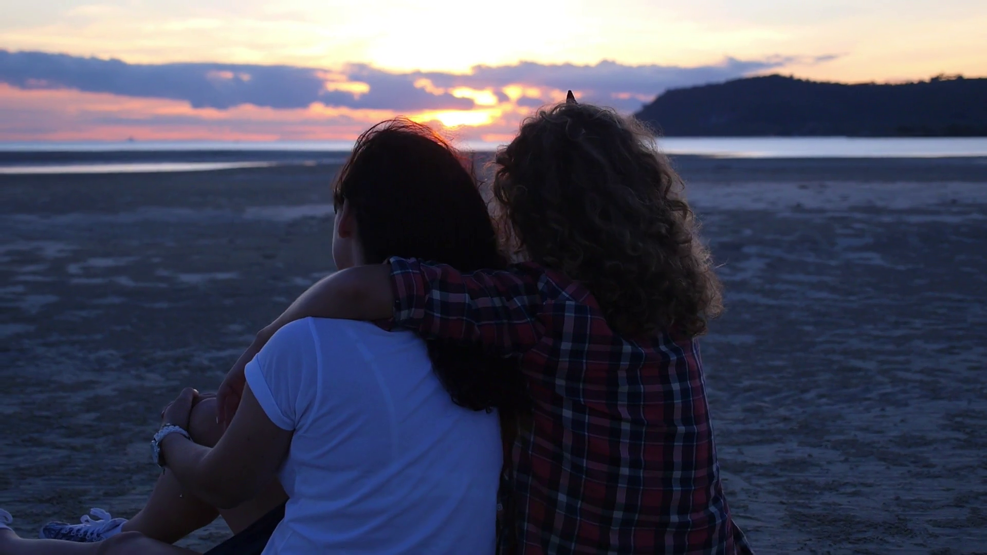 Girls Hugging On Beach At Sunset Stock Footage SBV-304583143 - Storyblocks