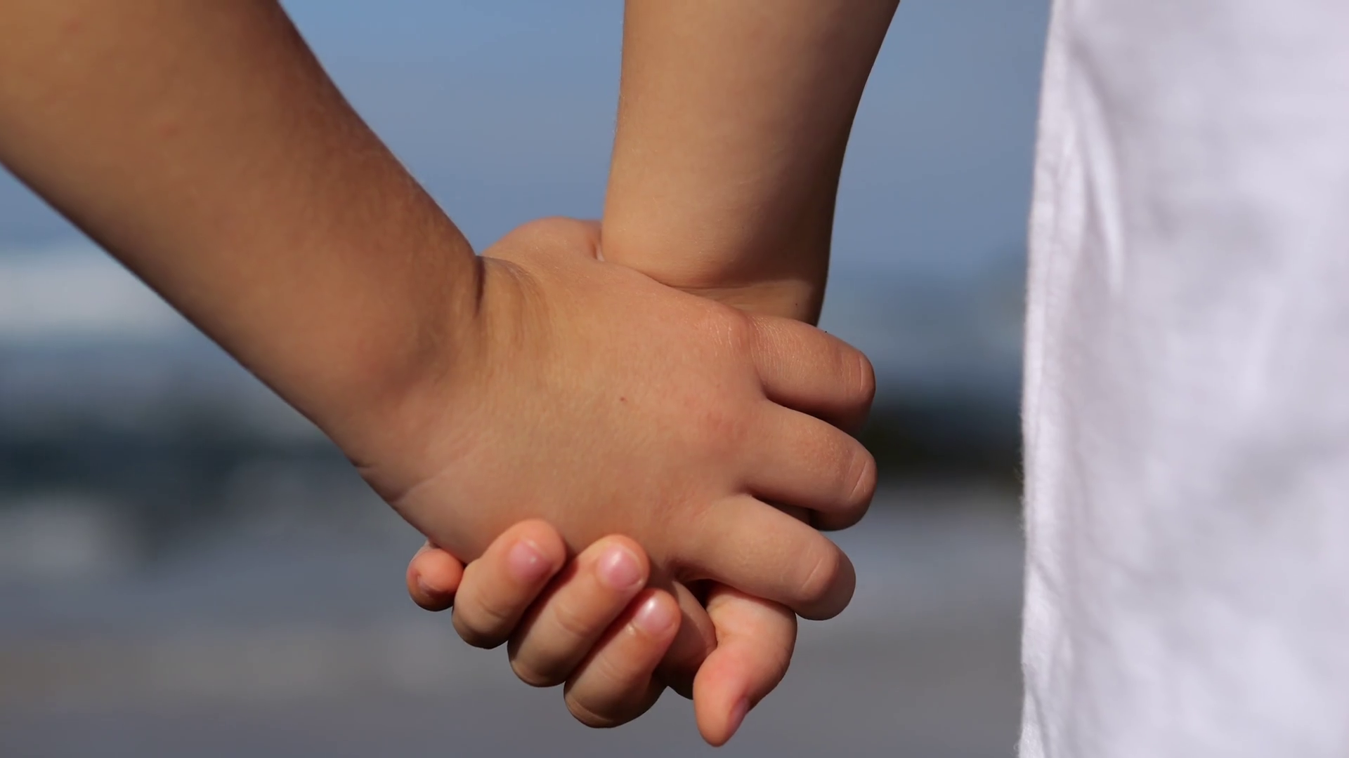 Close Up Of Children's Tightly Holding Hands Stock Footage SBV ...