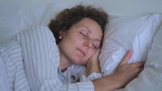 Woman Sleep Change Stock Footage: Royalty-Free Video Clips - Storyblocks