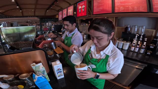 Starbucks Barista Stock Footage: Royalty-Free Video Clips - Storyblocks