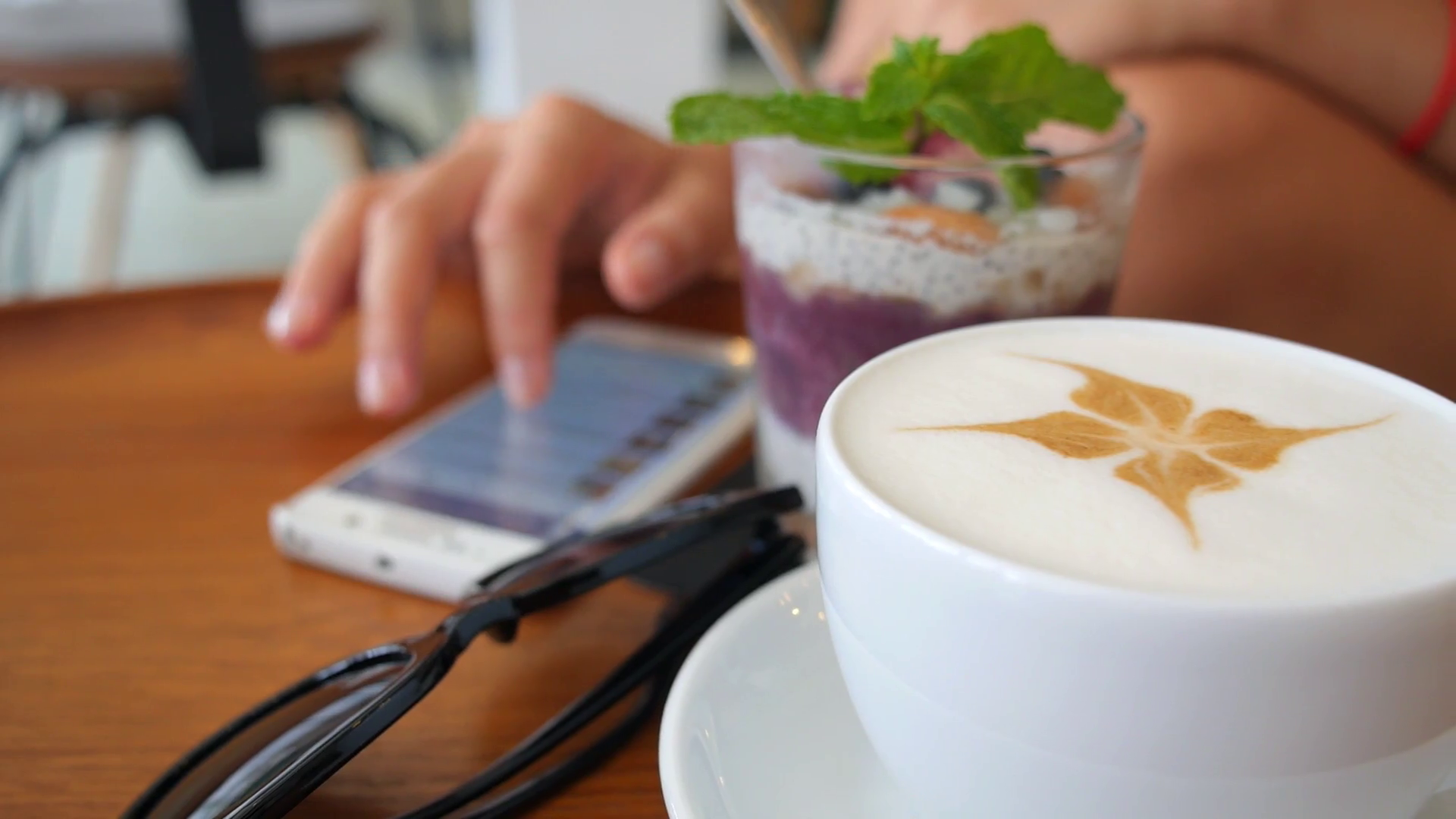 Using Smart Phone in Coffee Shop Stock Video Footage - Storyblocks