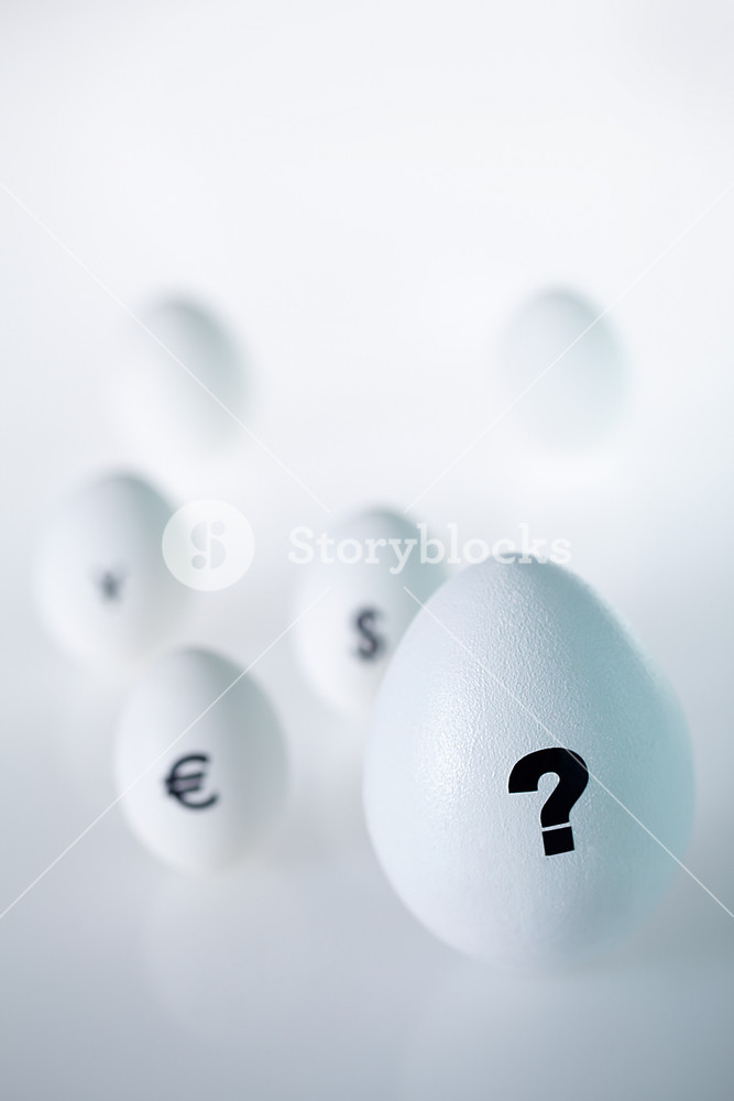 Close-up Of Big White Egg With Question Mark On It Among Other Eggs ...