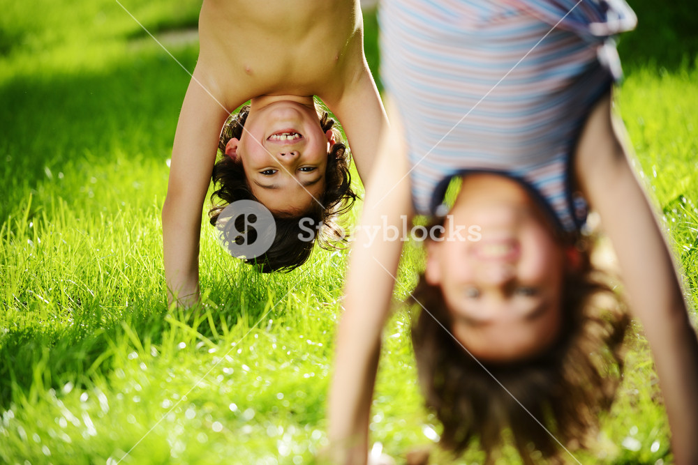 Group of happy children playing outdoors in spring park Royalty-Free ...