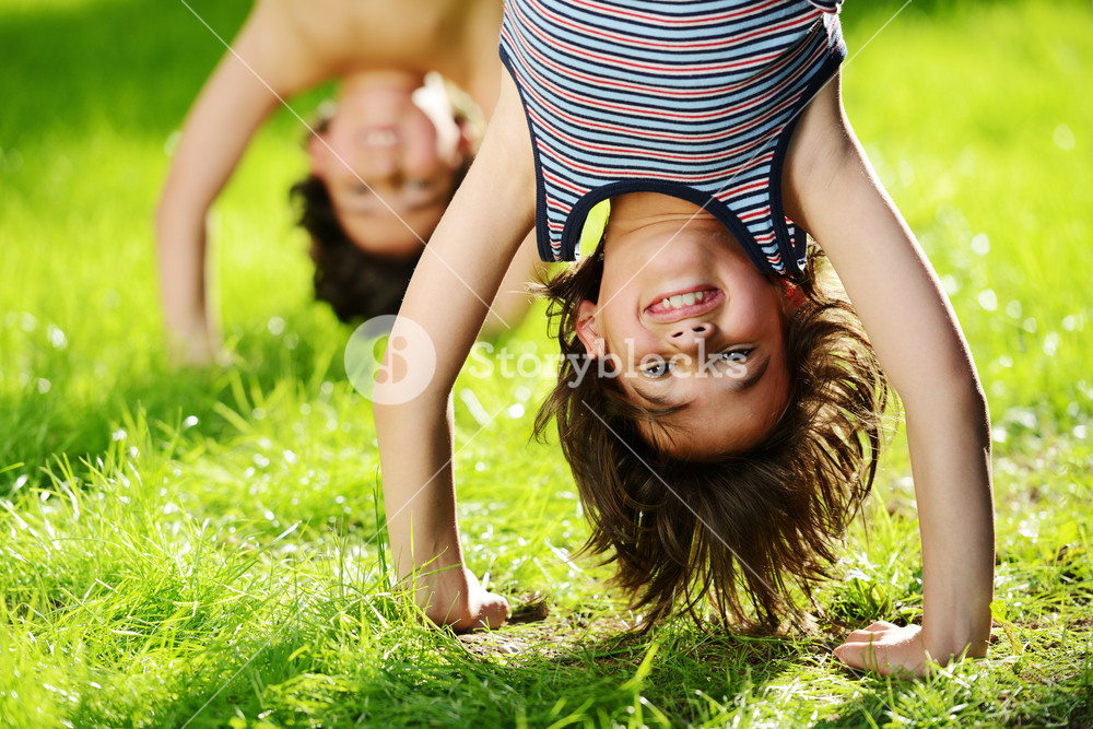 Group of happy children playing outdoors in spring park Royalty-Free ...