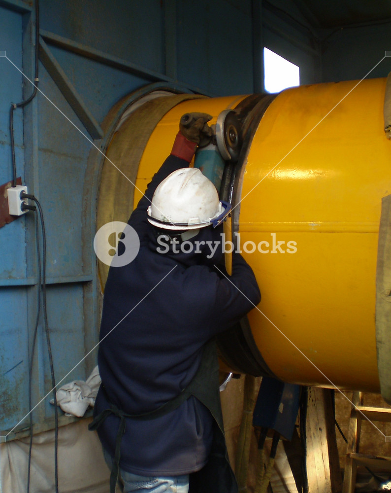 Welding of the pipeline. process of creation of welding connection by ...
