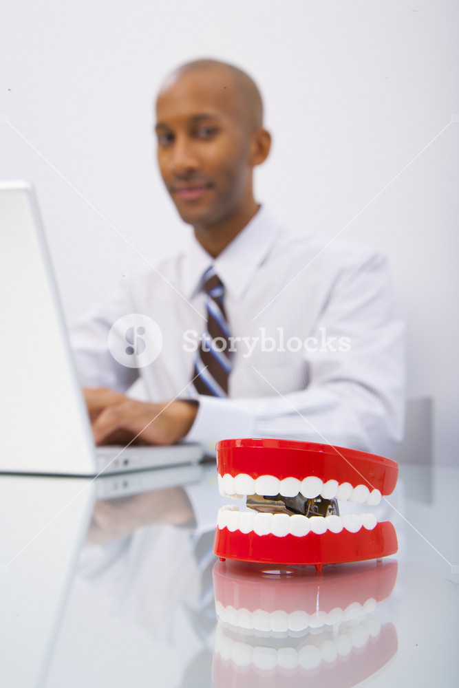 Chatter teeth on desk Royalty-Free Stock Image - Storyblocks