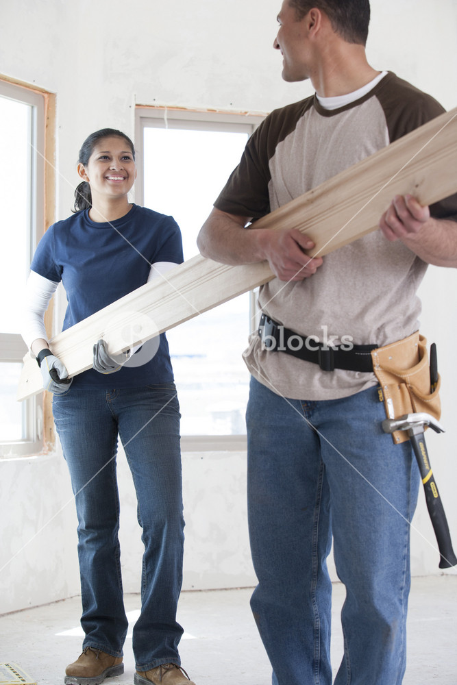 Couple building a home Royalty-Free Stock Image - Storyblocks