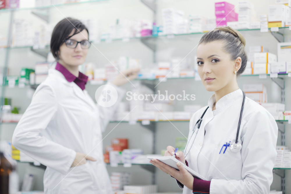 Team of pharmacist chemist woman in pharmacy drugstore Royalty-Free ...