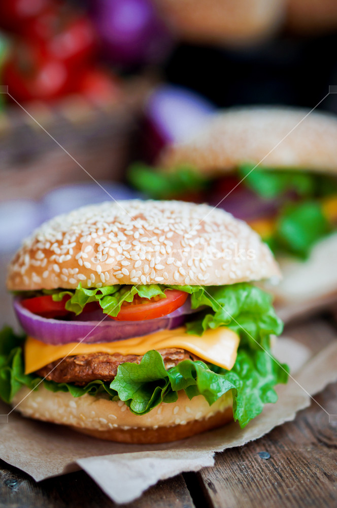 Closeup Of Home Made Burgers On Wooden Background Royalty-Free Stock ...