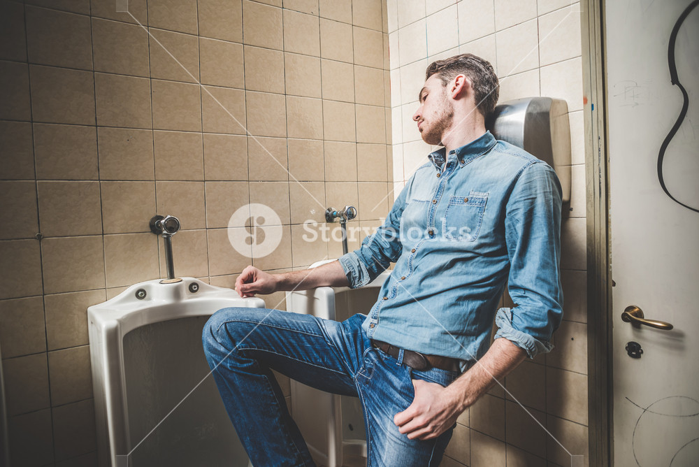 young handsome fashion model man in bathroom Royalty-Free Stock Image ...