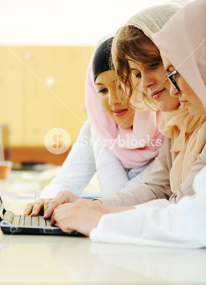 Multi ethnic group of teenage students inside the high school classroom ...