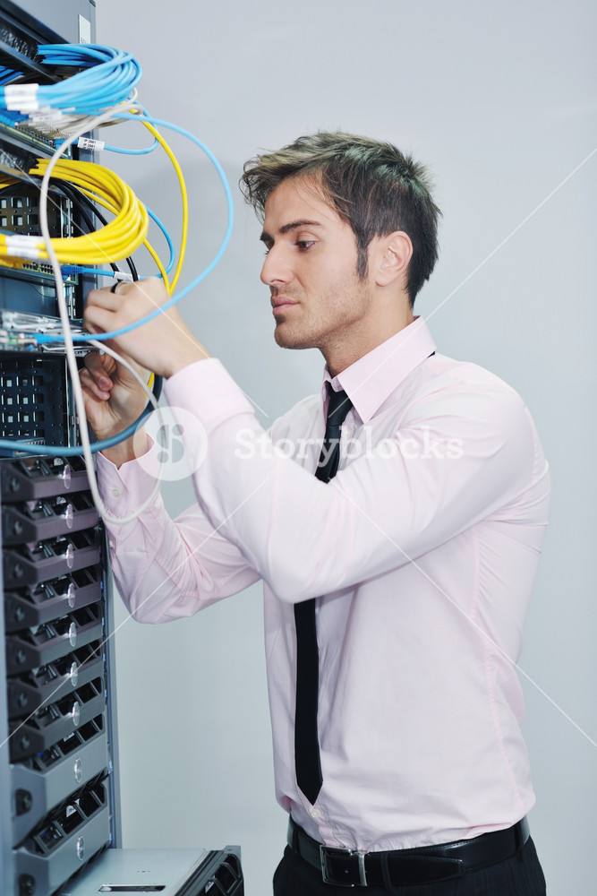 Young it engineer in datacenter server room Royalty-Free Stock Image ...