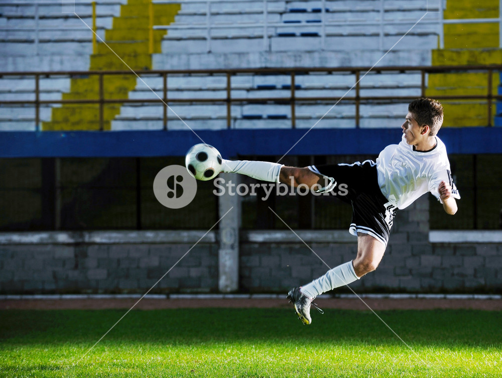 Soccer player in action Royalty-Free Stock Image - Storyblocks
