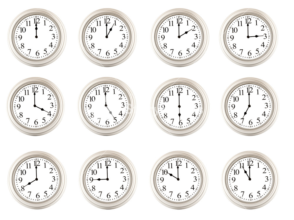 Twelve Clocks Showing Different Times Royalty Free Stock Image