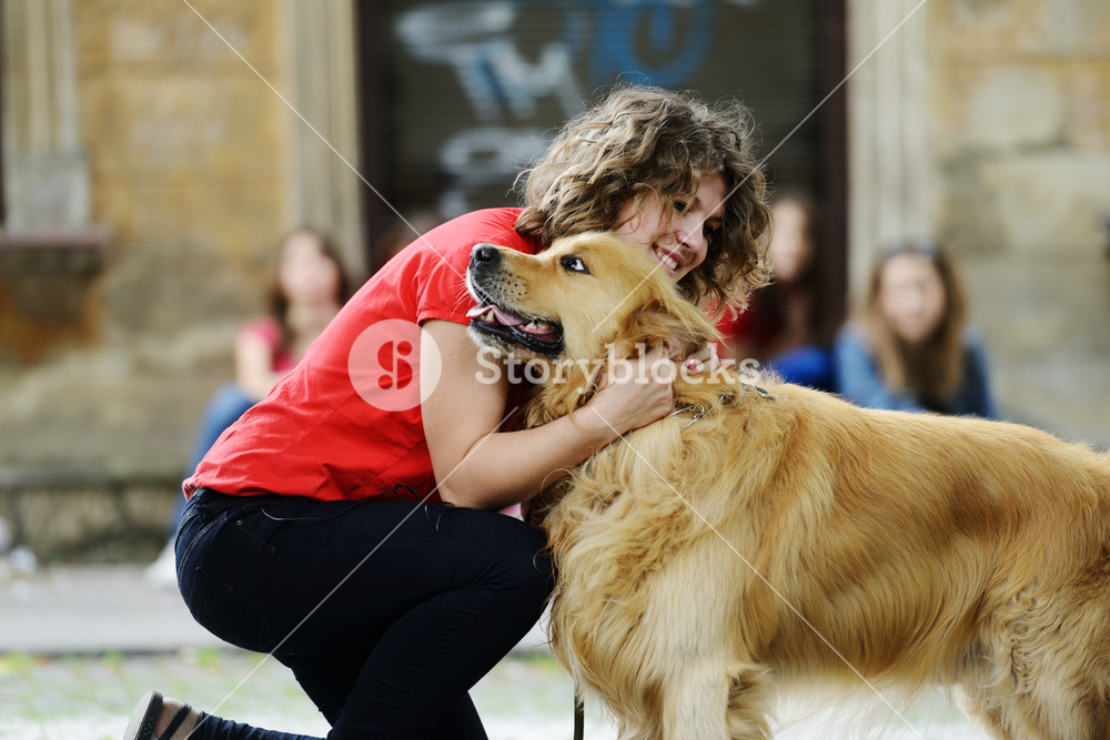 Stylish young people with a dog in the city Royalty-Free Stock Image ...